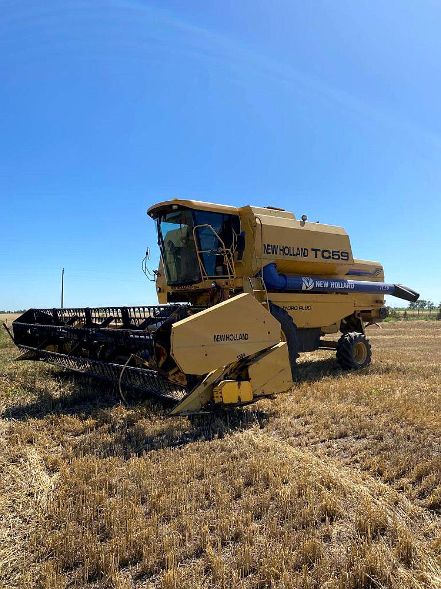 Cosechadora New Holland TC 59 2000 - 23 Pies - Año: 2000 - Agroads