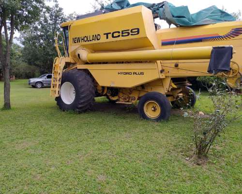 Vendo Cosechadora New Holland TC 59 con Girasolero Opcinal. - Agroads